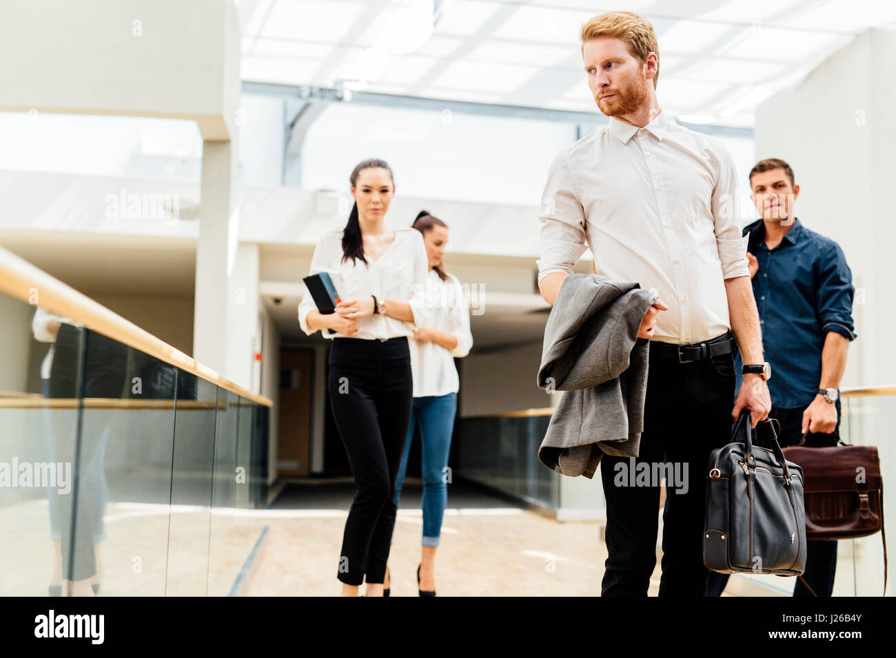 Group of professional business people posing Stock Photo - Alamy