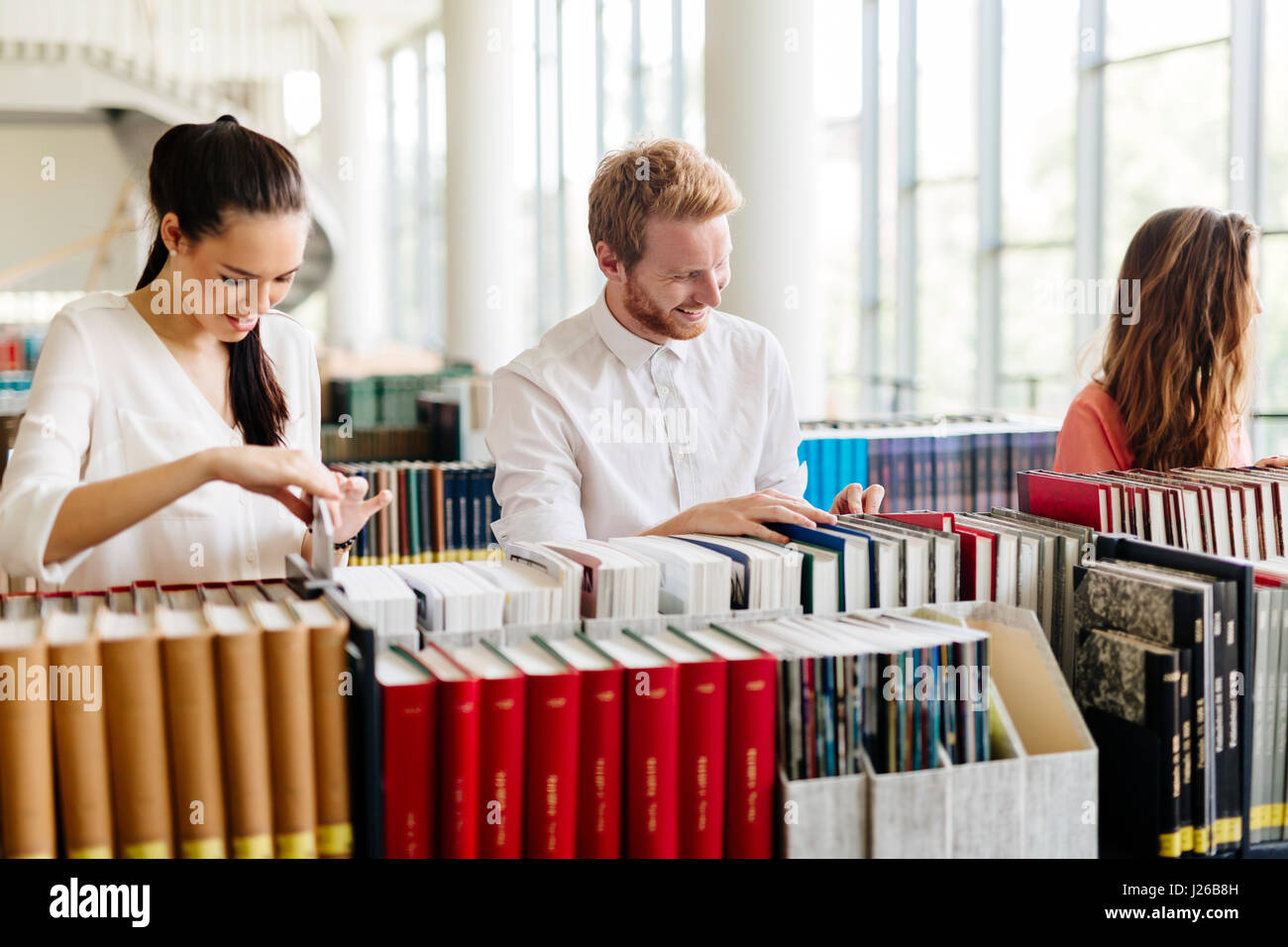 Students library reading books hi-res stock photography and images - Alamy