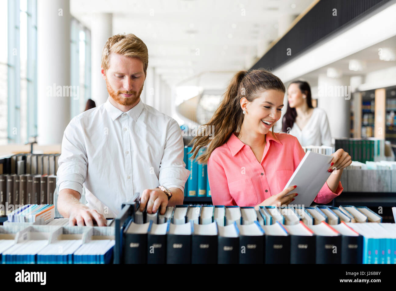 Searching for books hi-res stock photography and images - Alamy