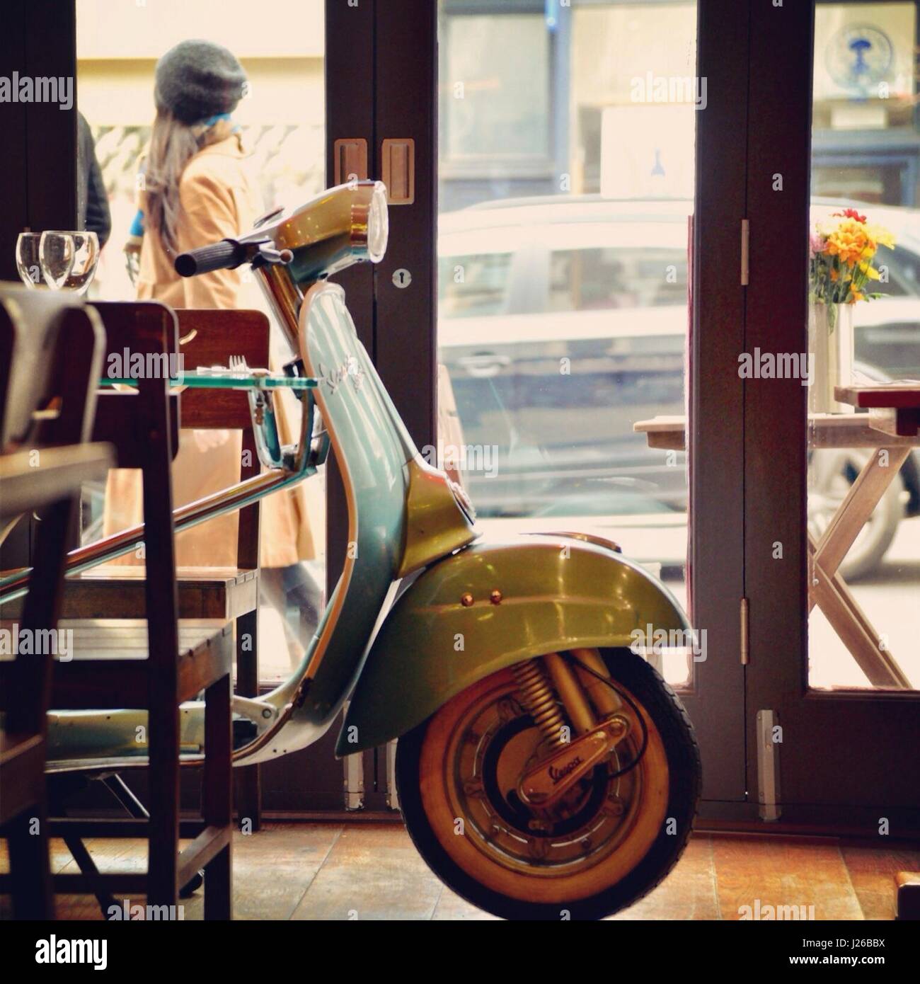 Restaurant interior with a scooter table Stock Photo - Alamy