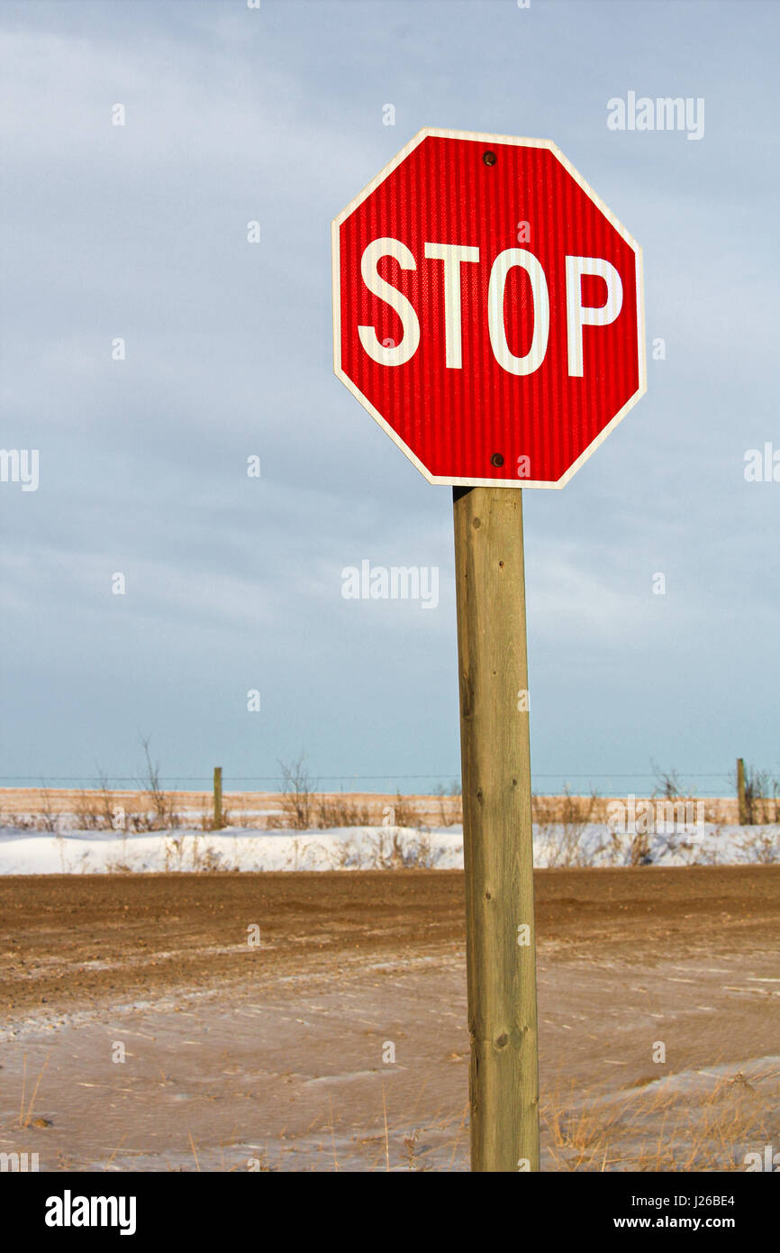 Country Road Stop Sign in Winter Stock Photo - Alamy