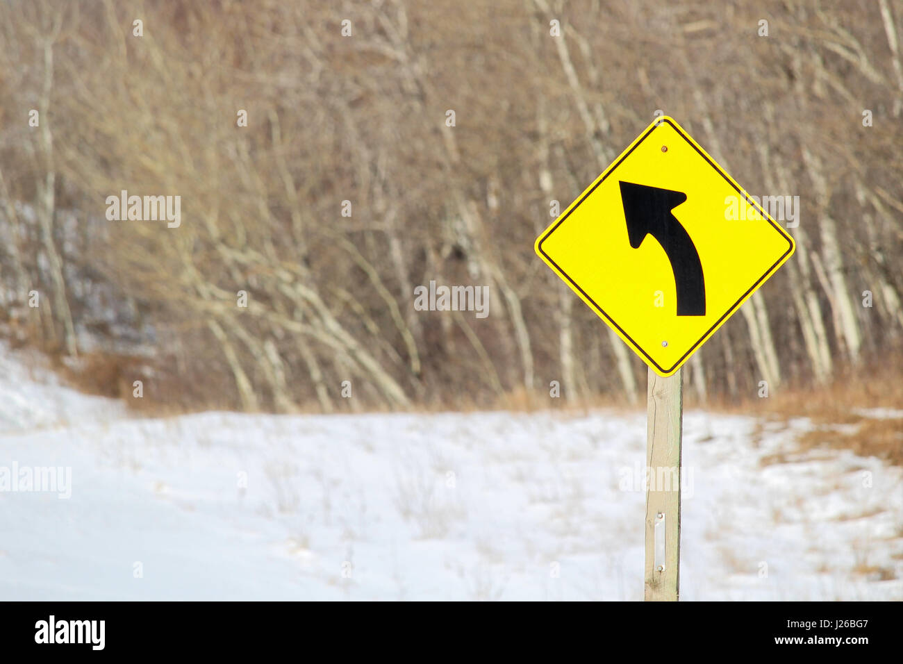 Sharp left arrow road sign hi-res stock photography and images - Alamy