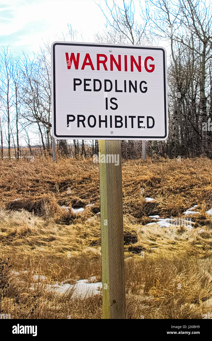 Warning peddling is prohibited sign Stock Photo - Alamy