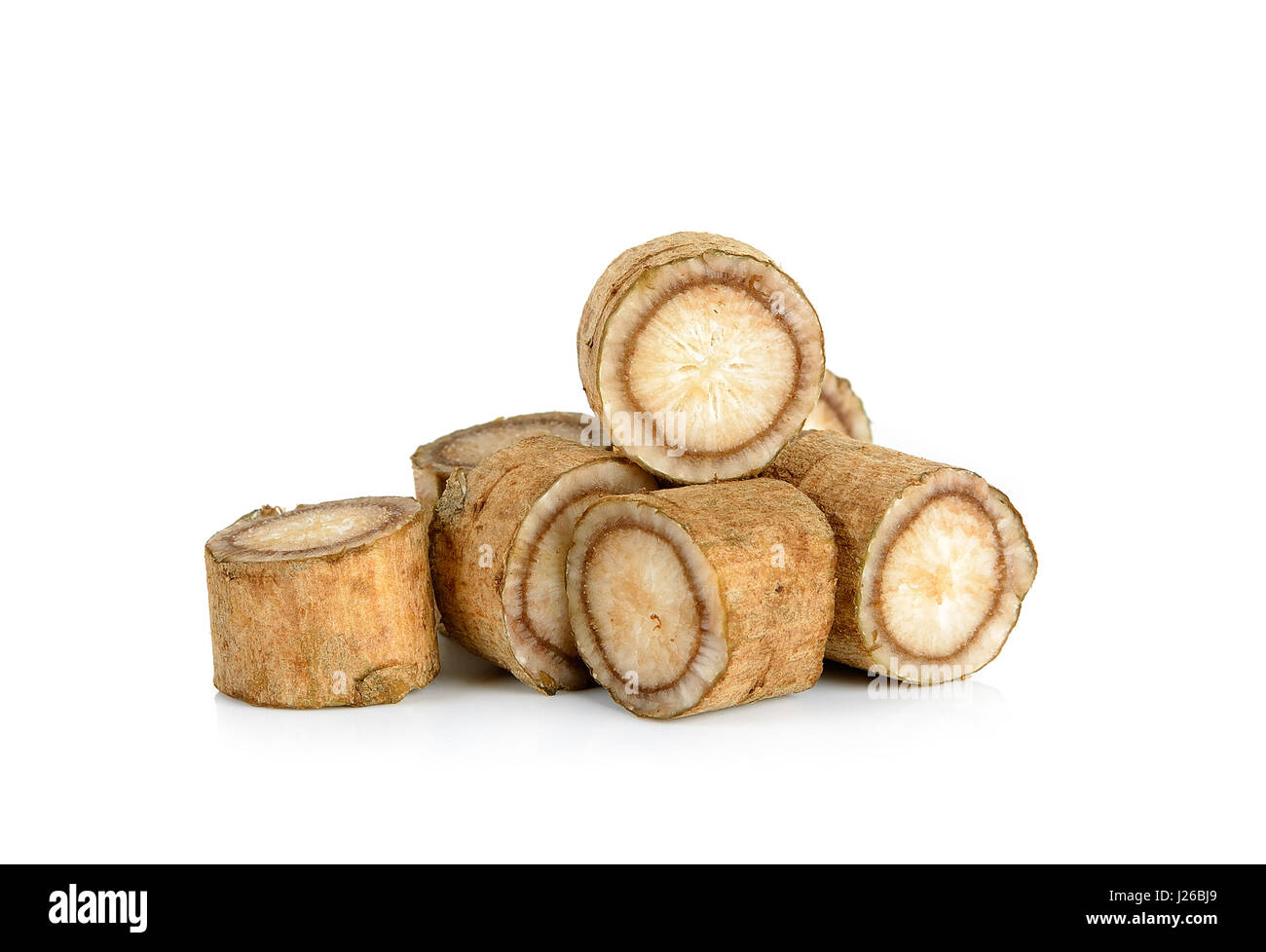 Sliced Burdock roots isolated on the white background Stock Photo - Alamy