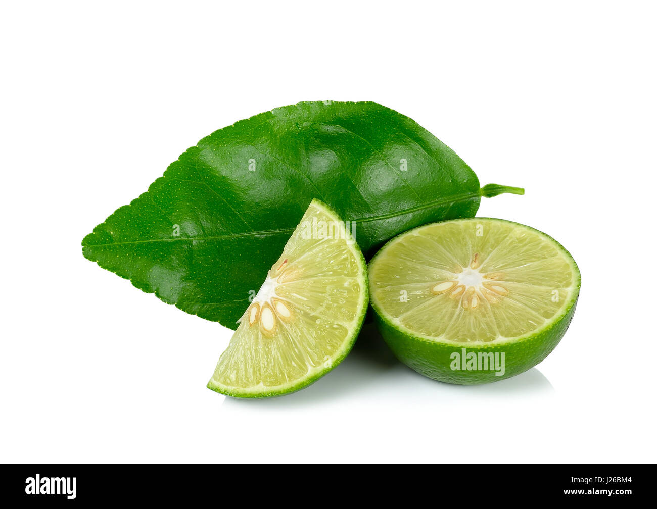lime and leaves isolated on the white background Stock Photo - Alamy