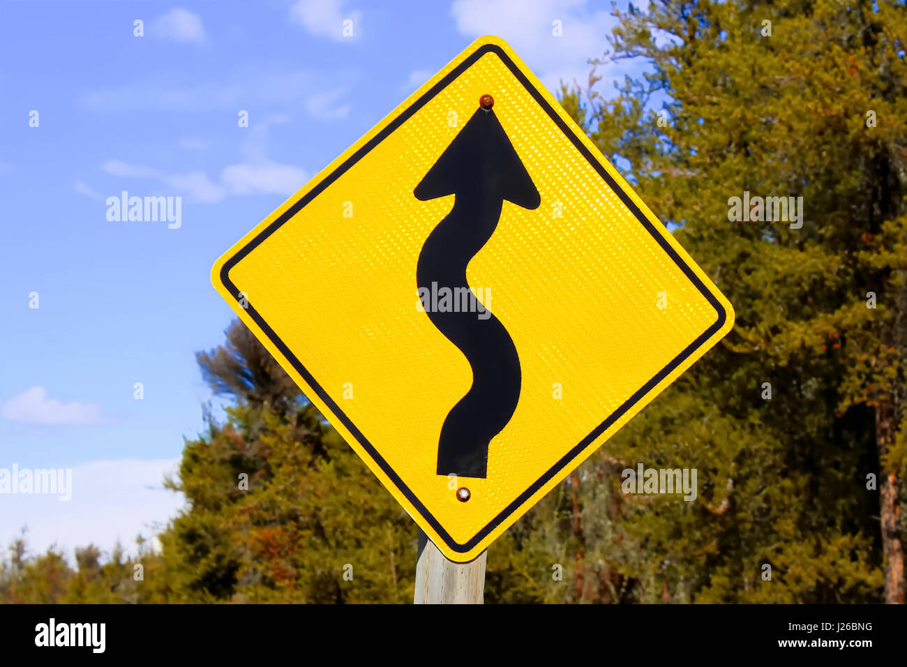 Road traffic sign, bend ahead hi-res stock photography and images - Alamy