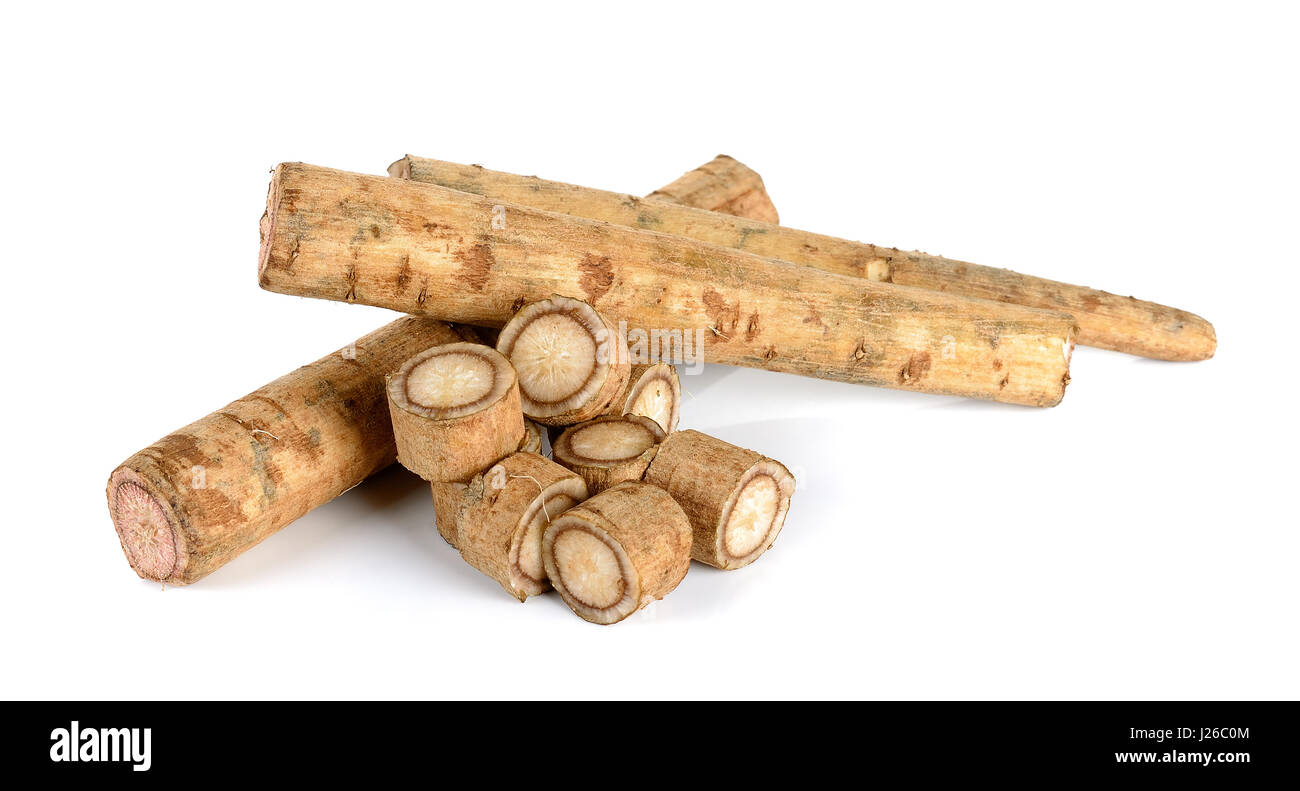 Burdock roots isolated on the white background Stock Photo - Alamy