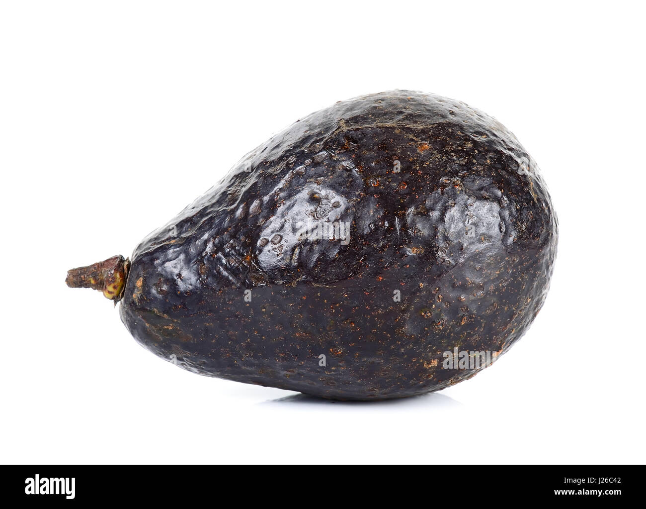 Dark avocado isolated on the white background Stock Photo - Alamy