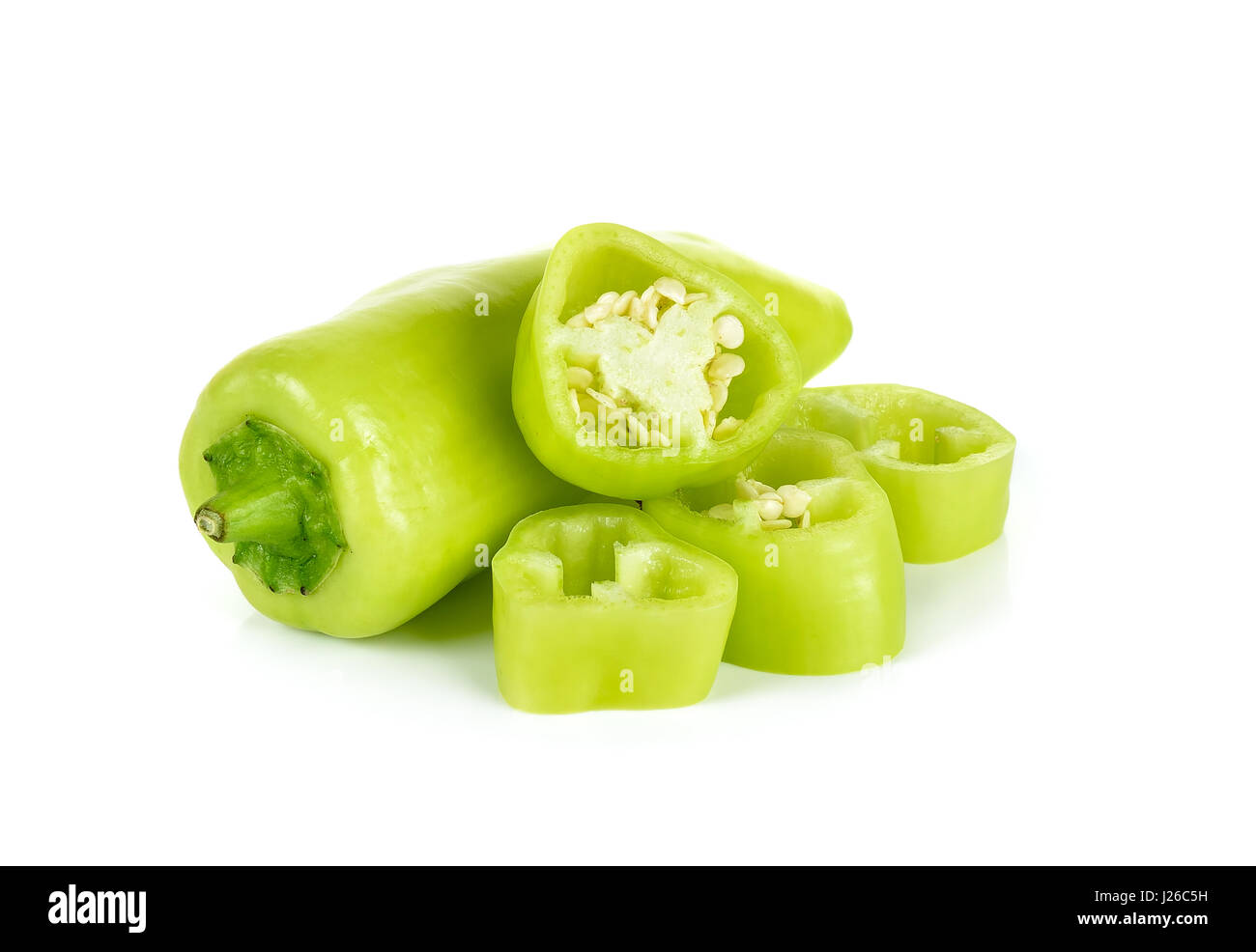 Sliced Green chilli isolated on the white background Stock Photo - Alamy