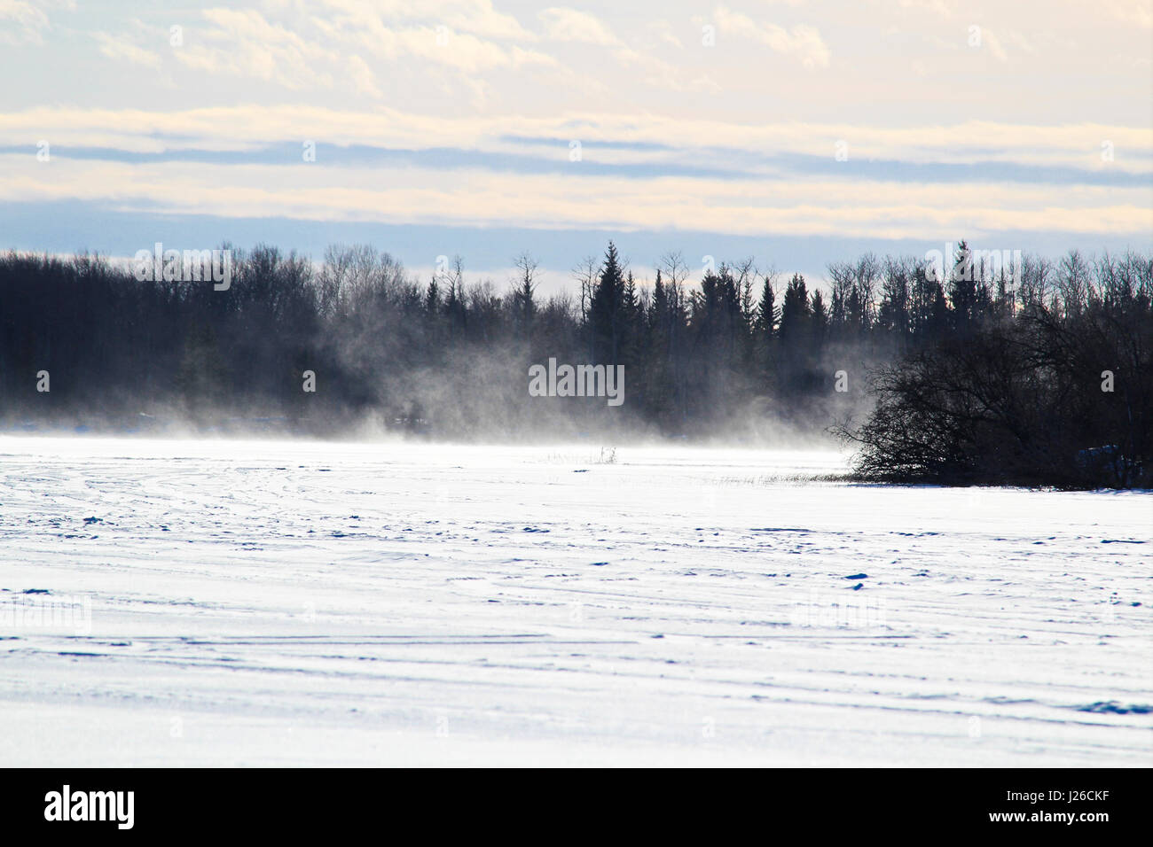 Blowing and Drifting Snow Across a Frozen Lake Stock Photo - Alamy