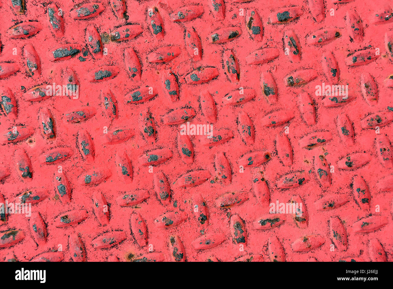 orange painted diamond plate metal surface Stock Photo - Alamy