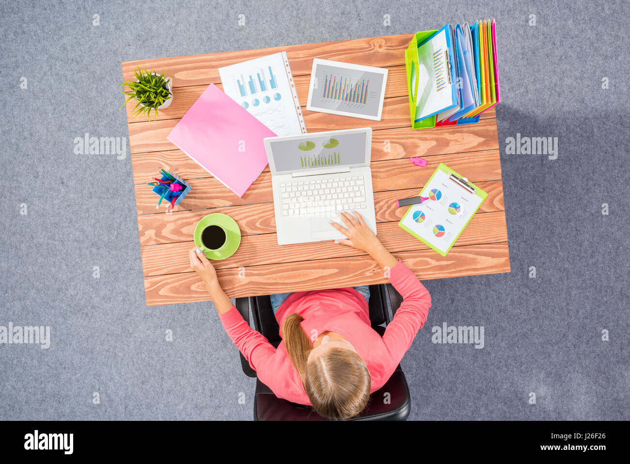 Woman documents computer charts hi-res stock photography and images - Alamy