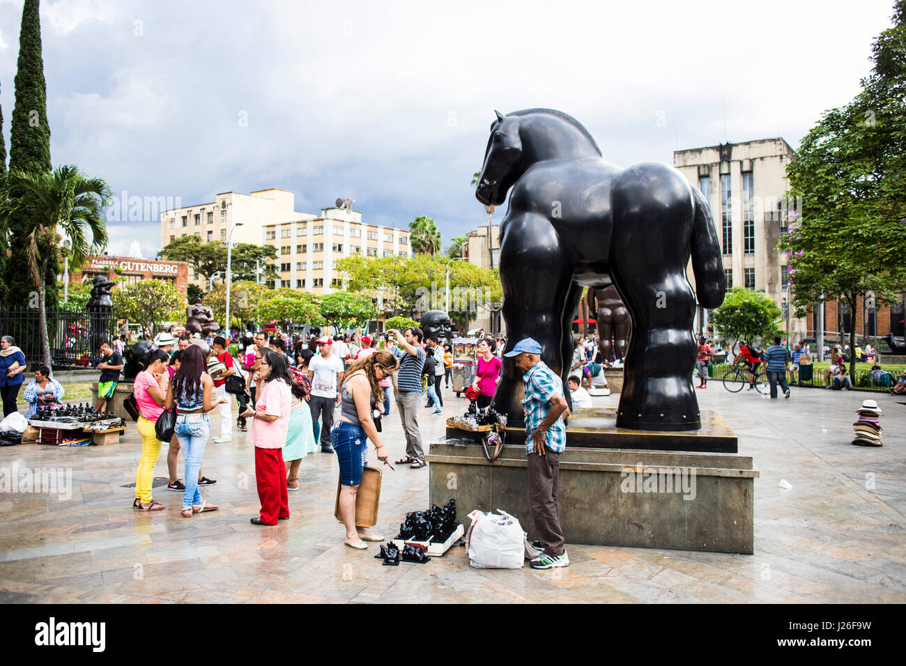 Sculptures and people in Fernando Botero Square Stock Photo - Alamy