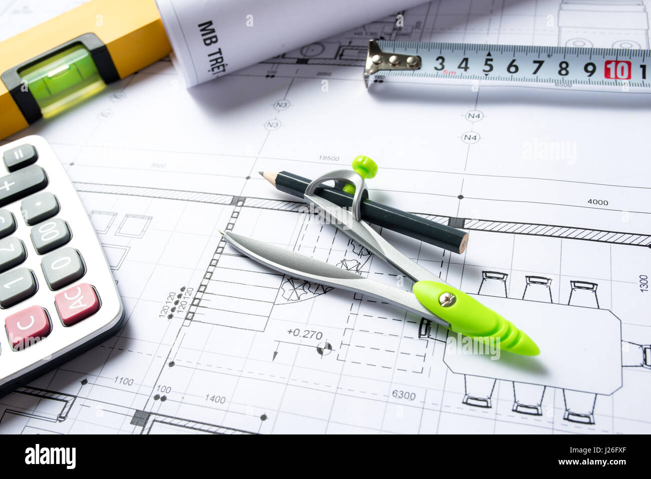House plans with calculator for costing estimate Stock Photo - Alamy