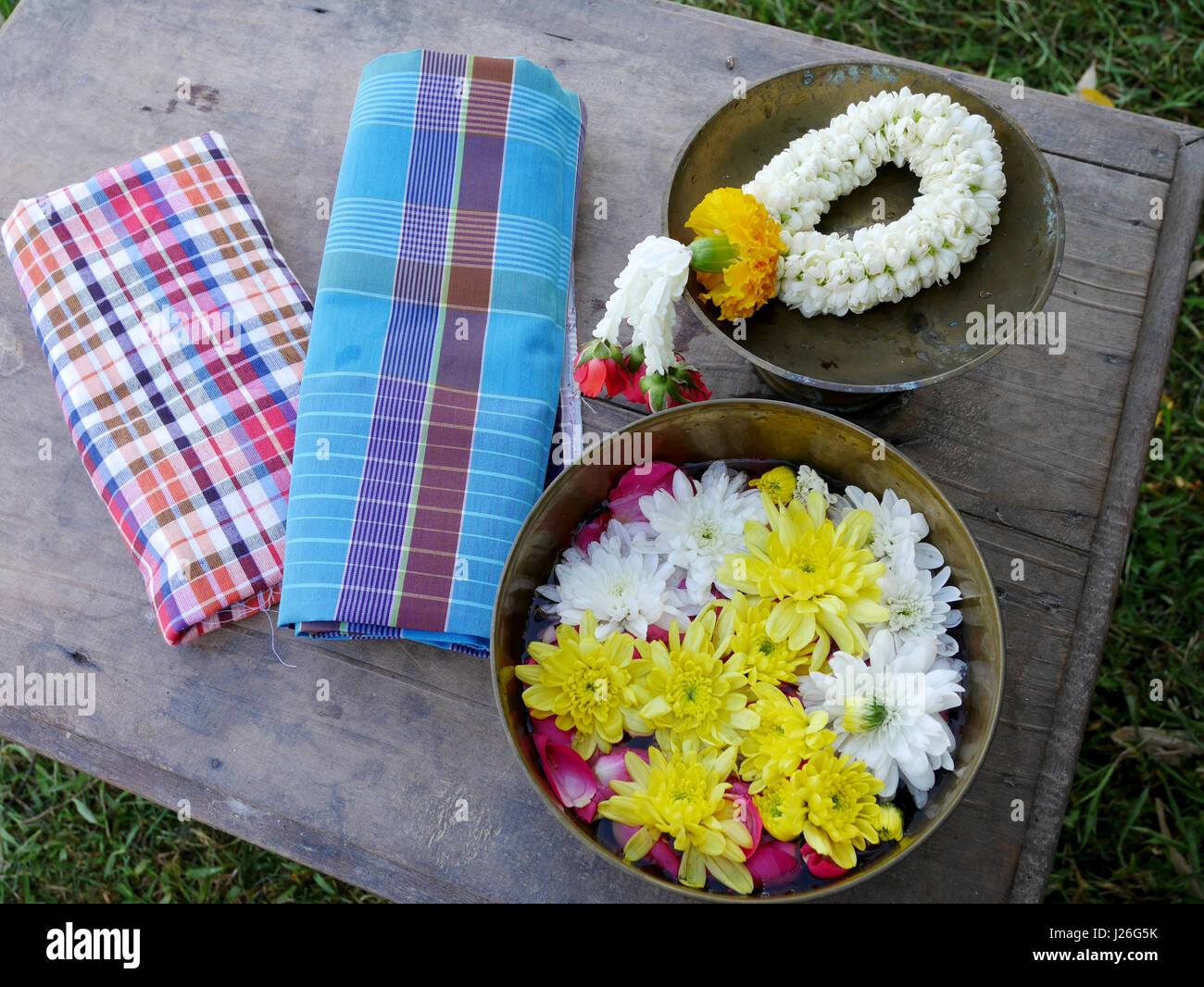 Traditional thai in Songkran day bring garland and petal flowers on ...