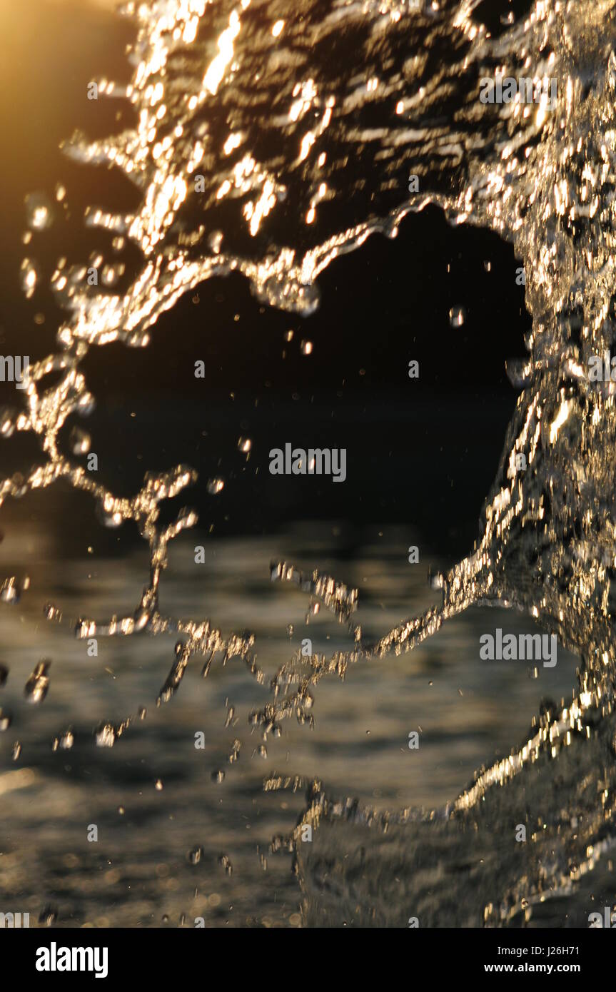 water falling in the sun light Stock Photo - Alamy