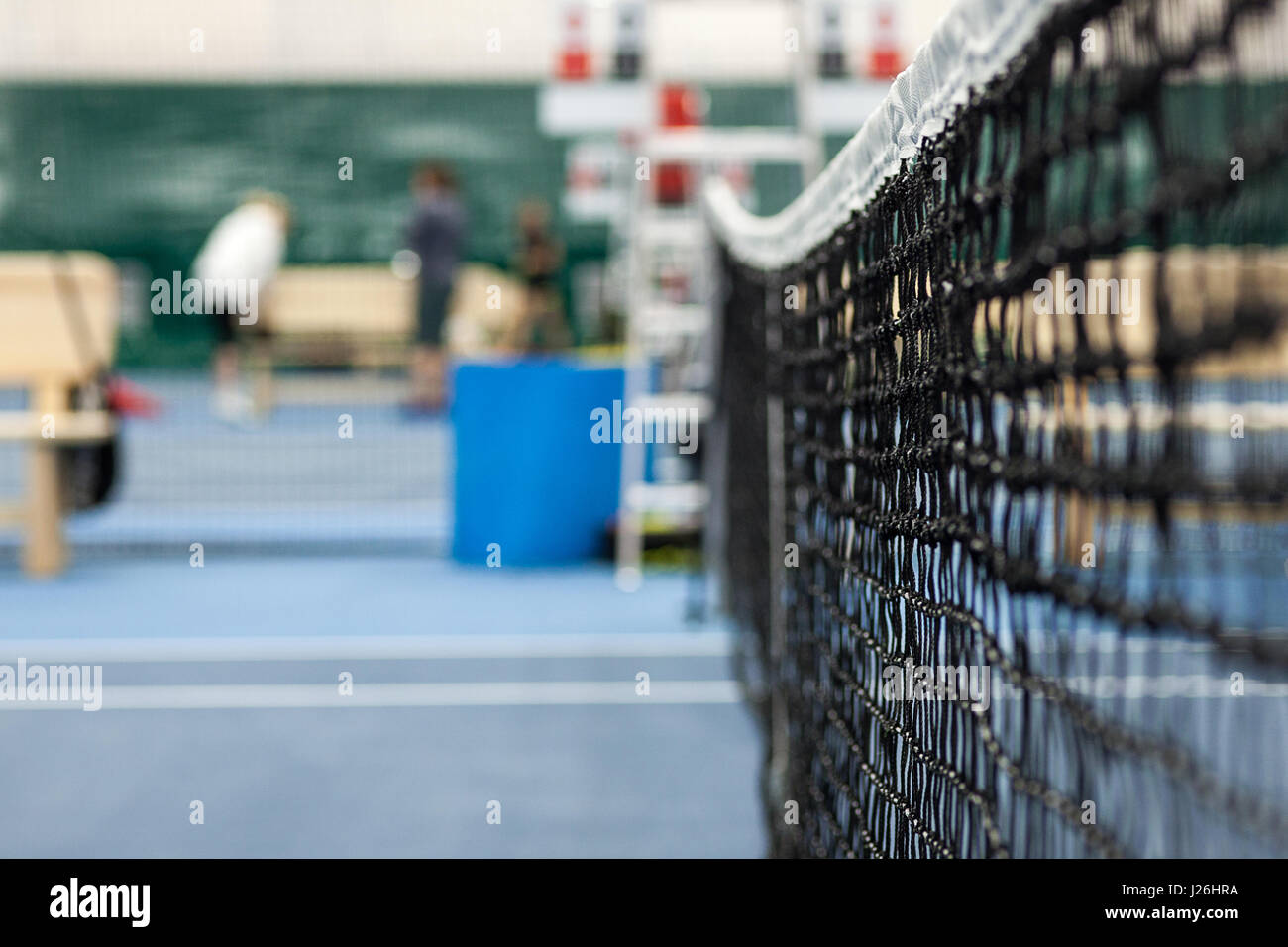 Close up view of tennis court through the net Stock Photo - Alamy
