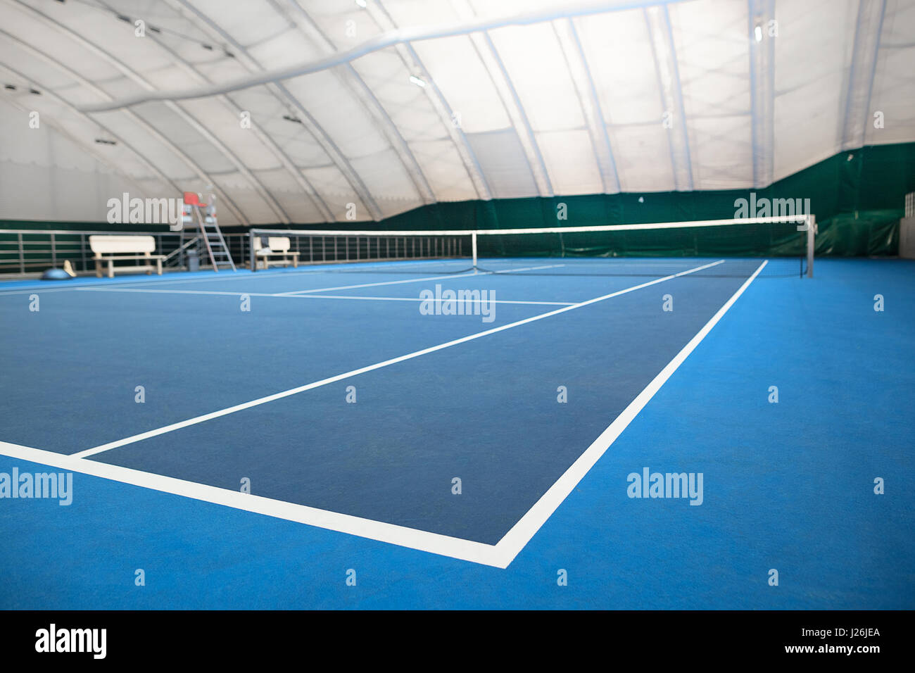 The abstract indoor tennis court Stock Photo - Alamy