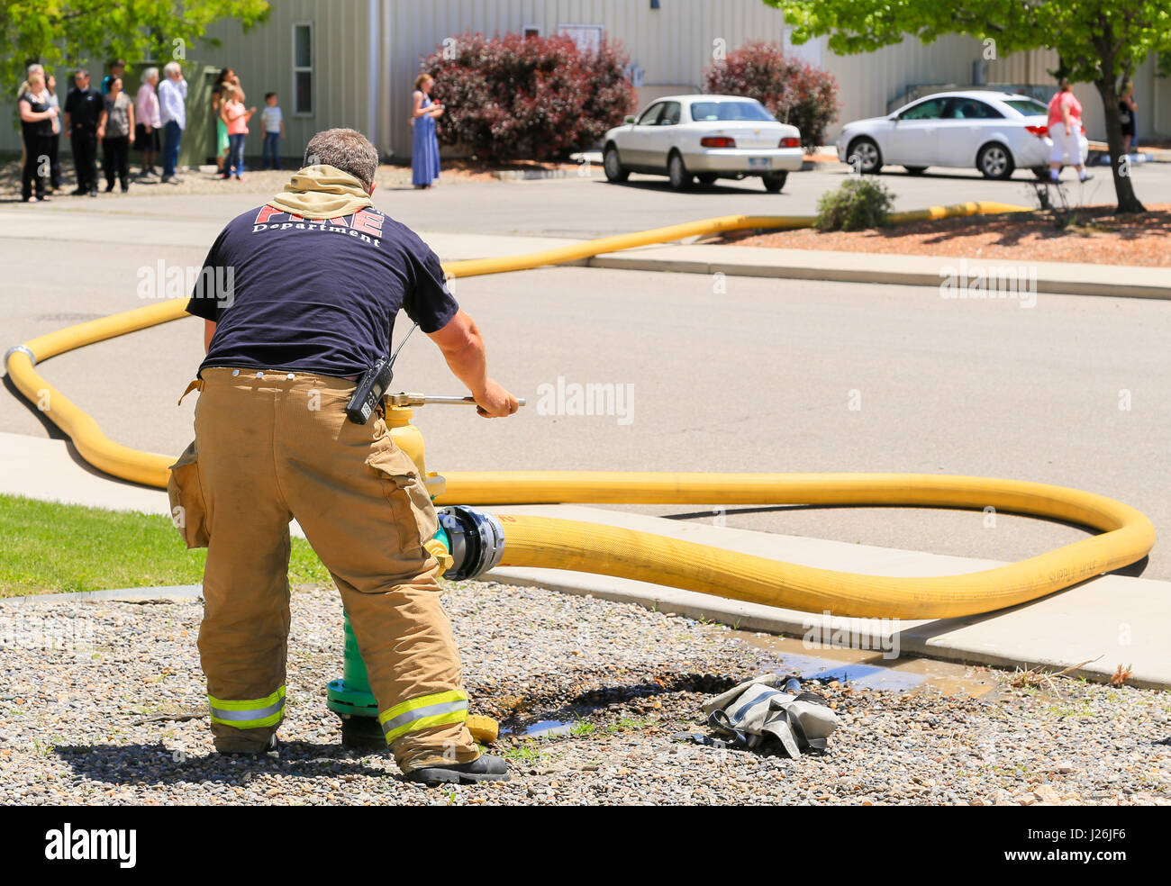 Fire fighter in action scene hi-res stock photography and images - Alamy