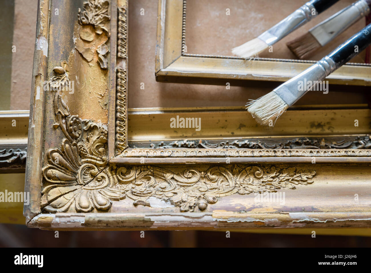 Old wooden painting frames in painter studio Stock Photo - Alamy