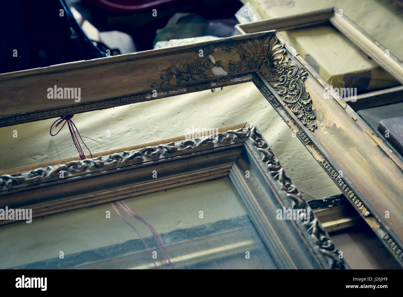 Old wooden painting frames in painter studio Stock Photo - Alamy