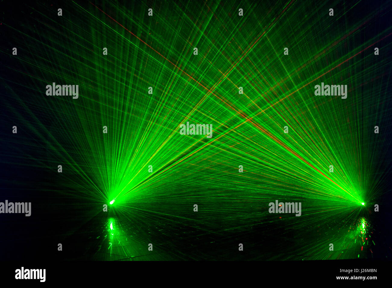 Abstract Colourful green laser show light in night Stock Photo - Alamy