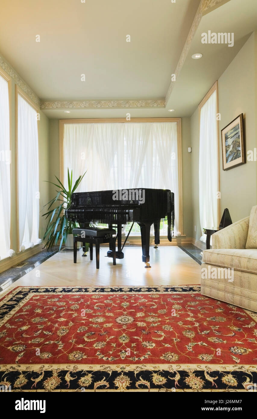 Music room with a piano inside a residential home Stock Photo - Alamy