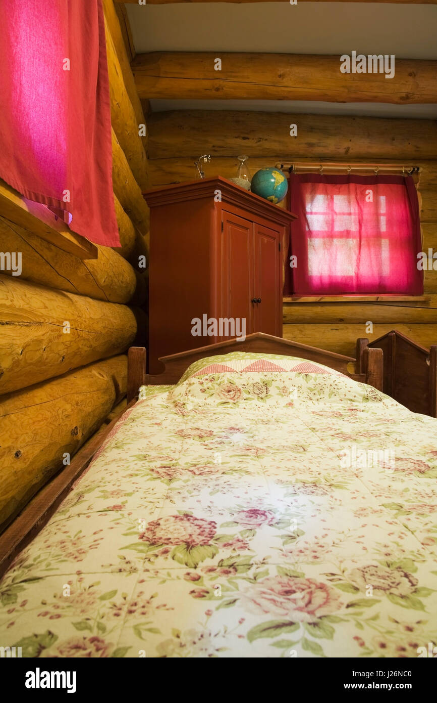 Guest bedroom inside a 2003 built cottage style residential log home ...