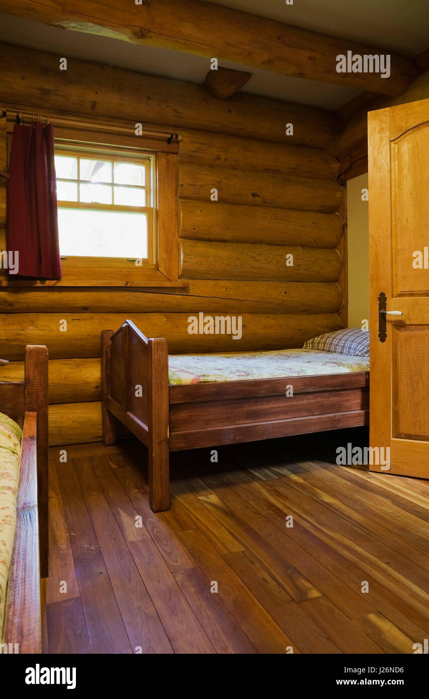 Guest bedroom inside a 2003 built cottage style residential log home ...