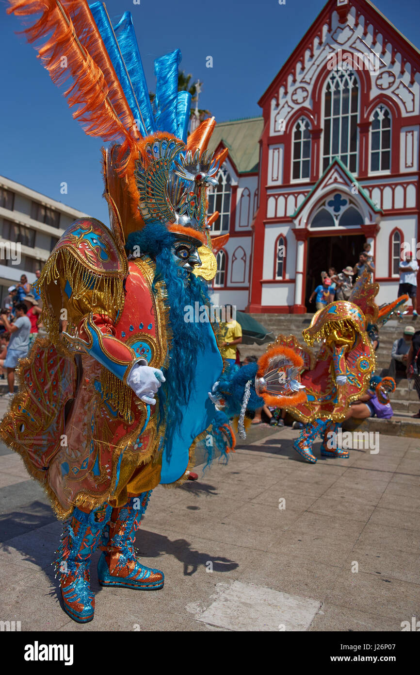 Masked Morenada Dancer dressed in an ornate costume performing during a ...