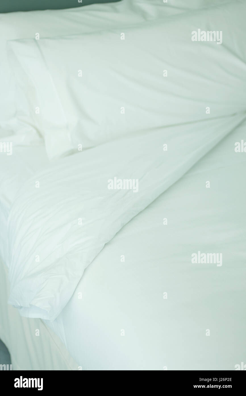 Luxury five star hotel bedroom bed sheets and linen clean and pressed ...