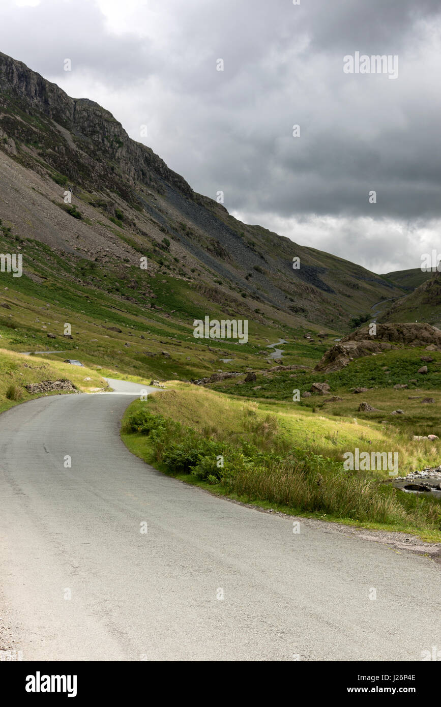 Single track mountain road with by-passing places for two-way traffic ...