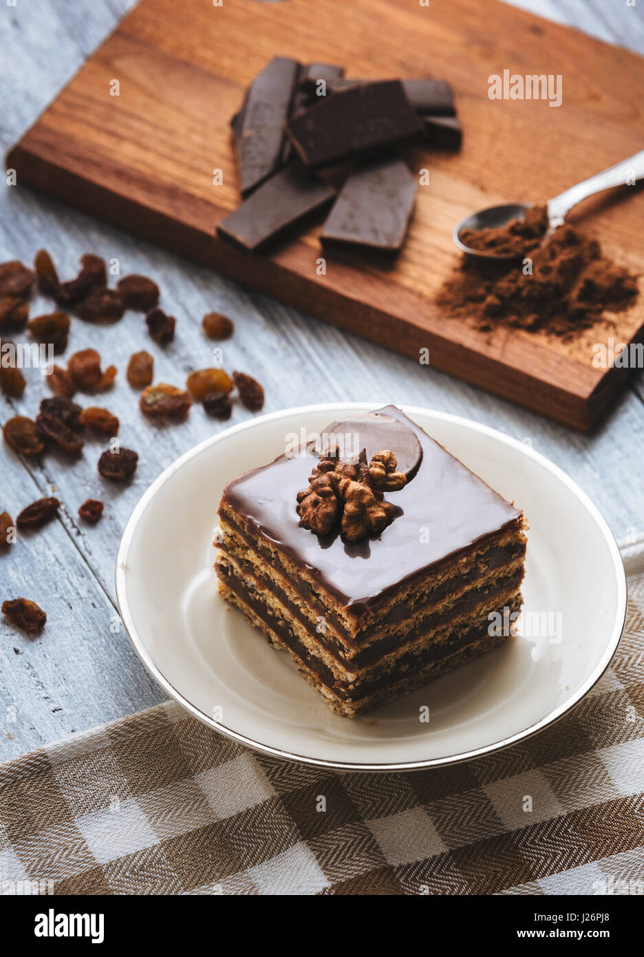 Homemade chocolate cake known as Reform cake on wooden table. Toned ...