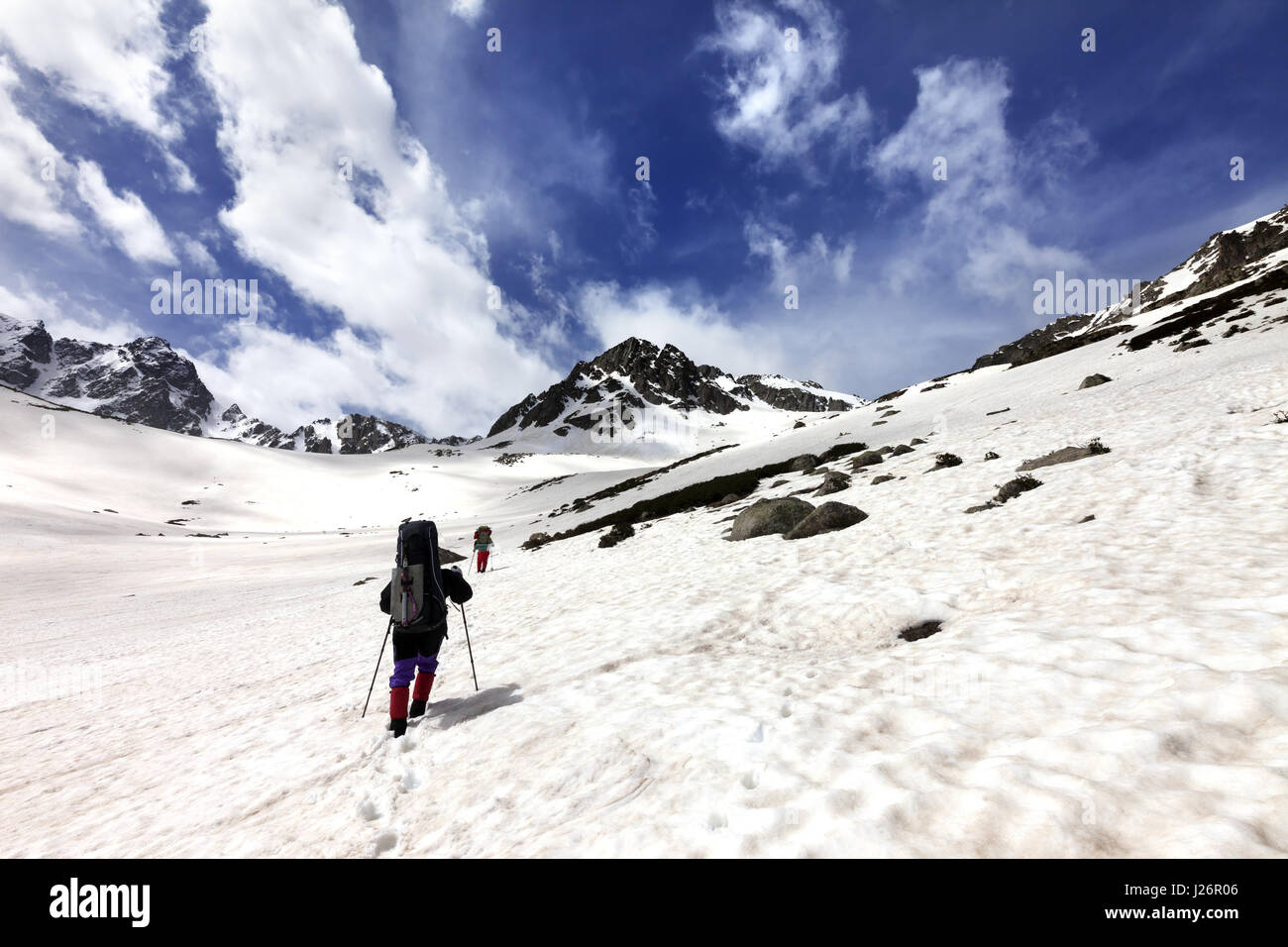 Two hikers in snow plateau. Turkey, Kachkar Mountains, highest part of ...