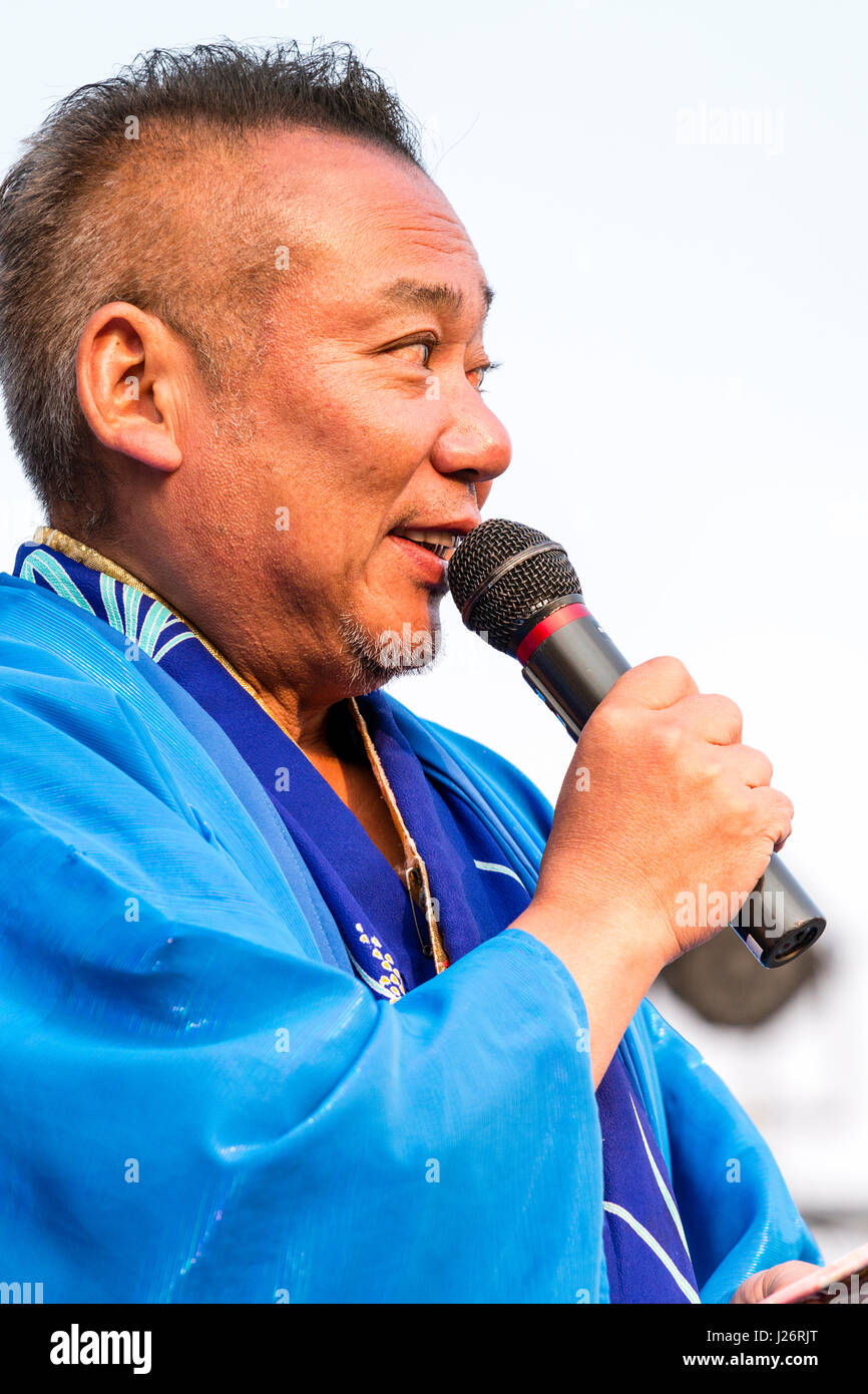 Japan, Kumamoto, Hinokuni Yosakoi Festival. Japanese male presenter in ...