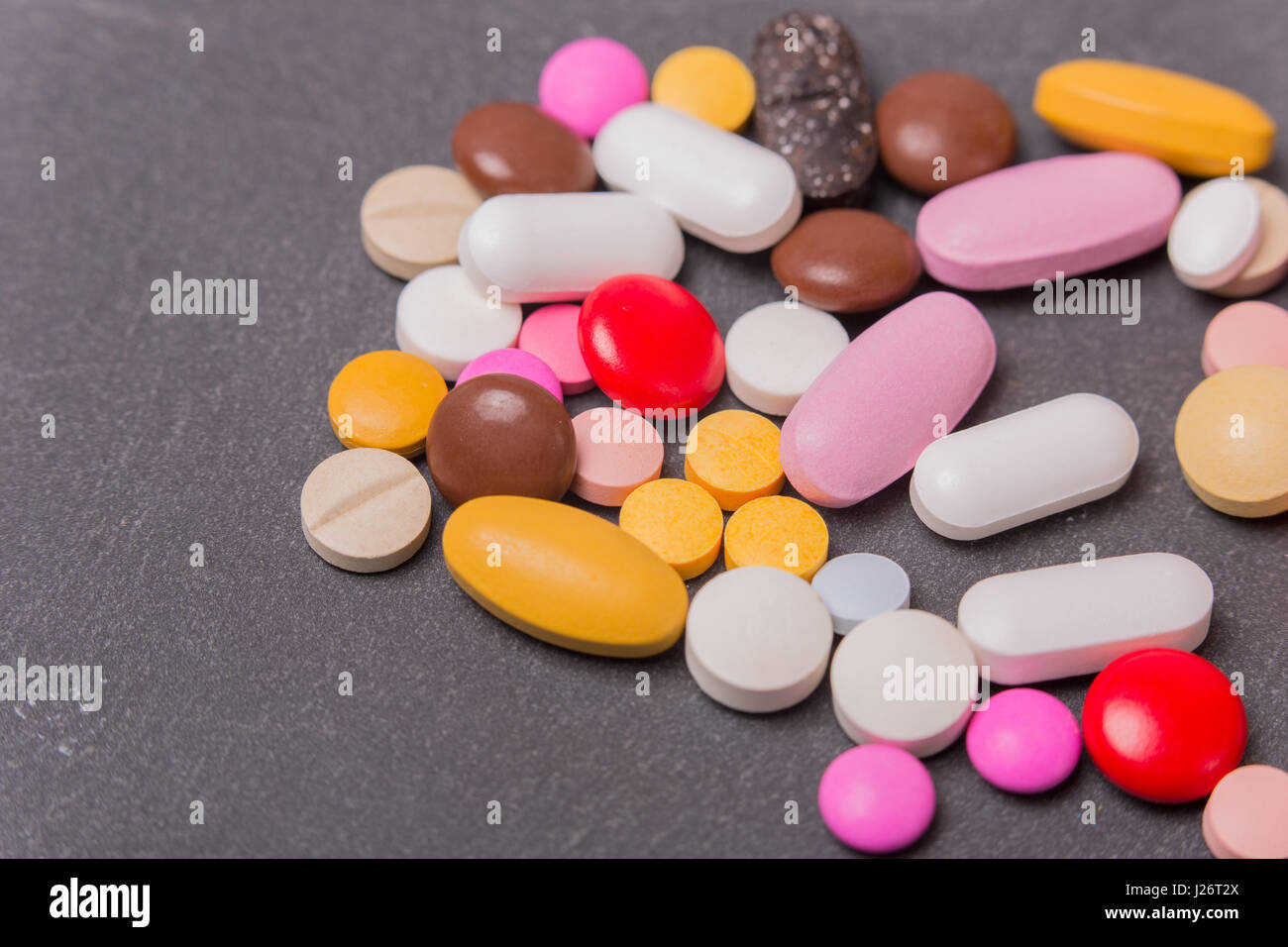 different Tablets pills capsule heap mix therapy drugs Stock Photo - Alamy