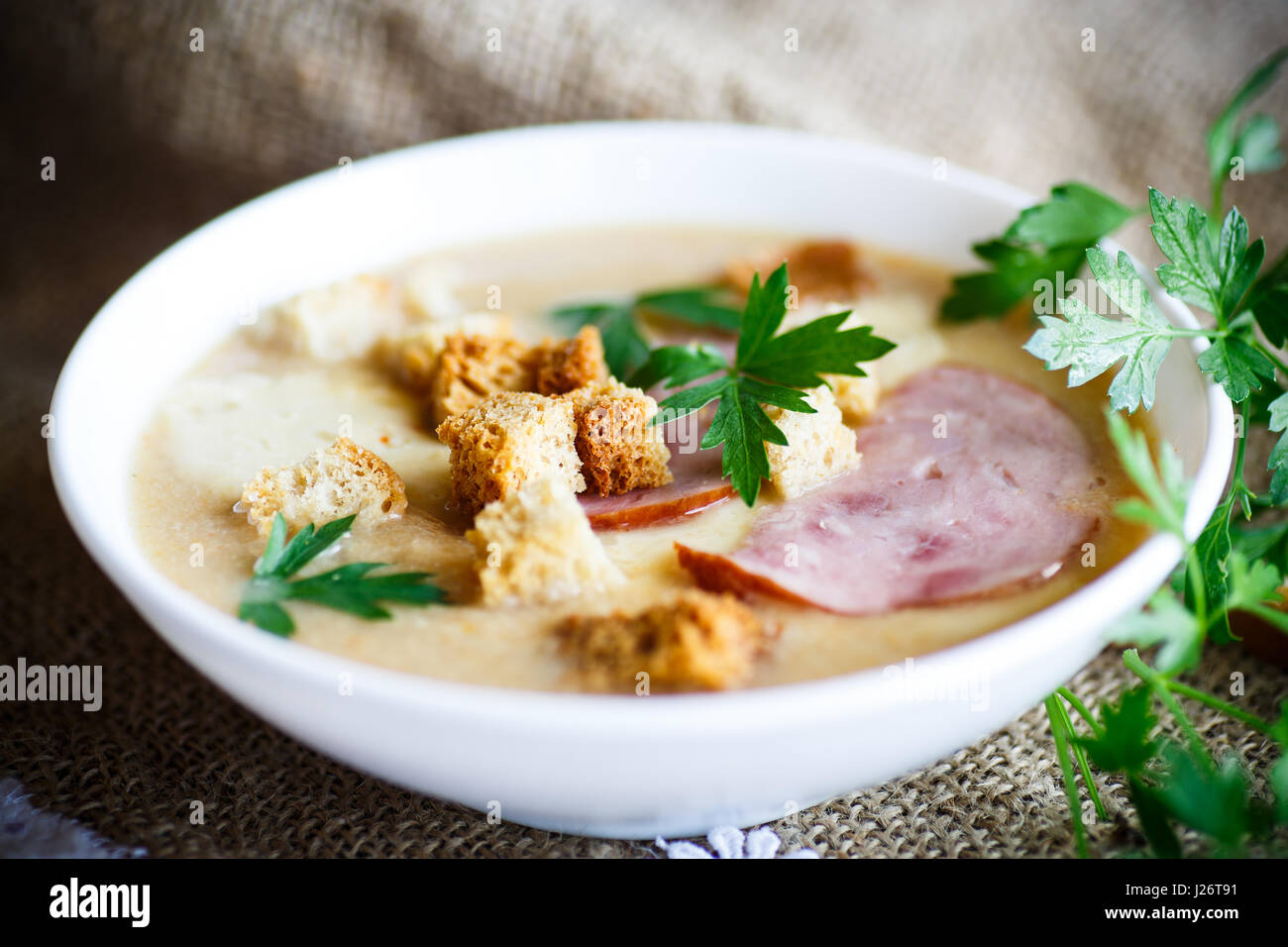 Vegetable soup puree with cheese, bacon Stock Photo - Alamy