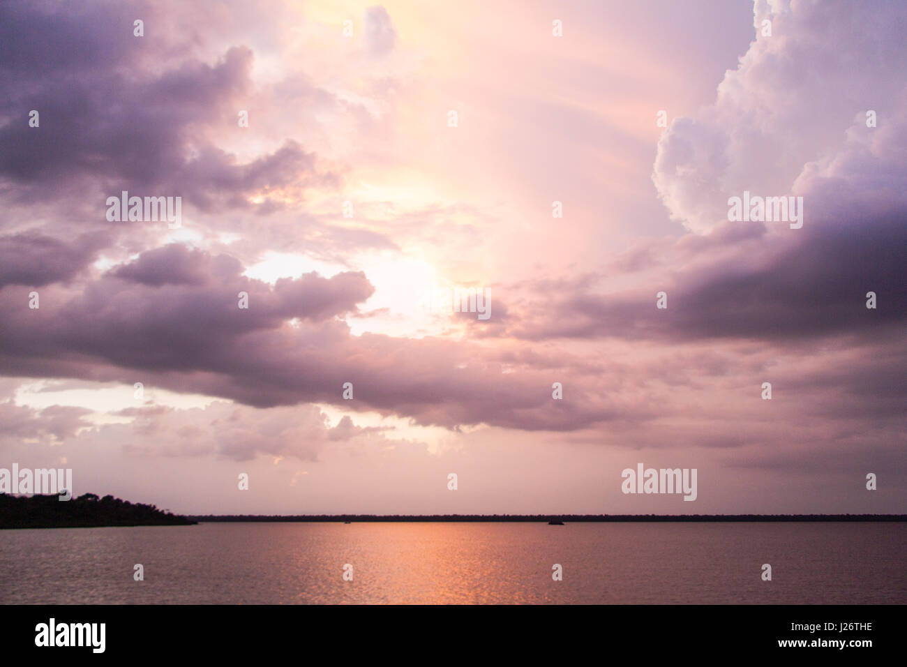 Rain clouds at afternoon over the Amazon river, Brazil Stock Photo - Alamy