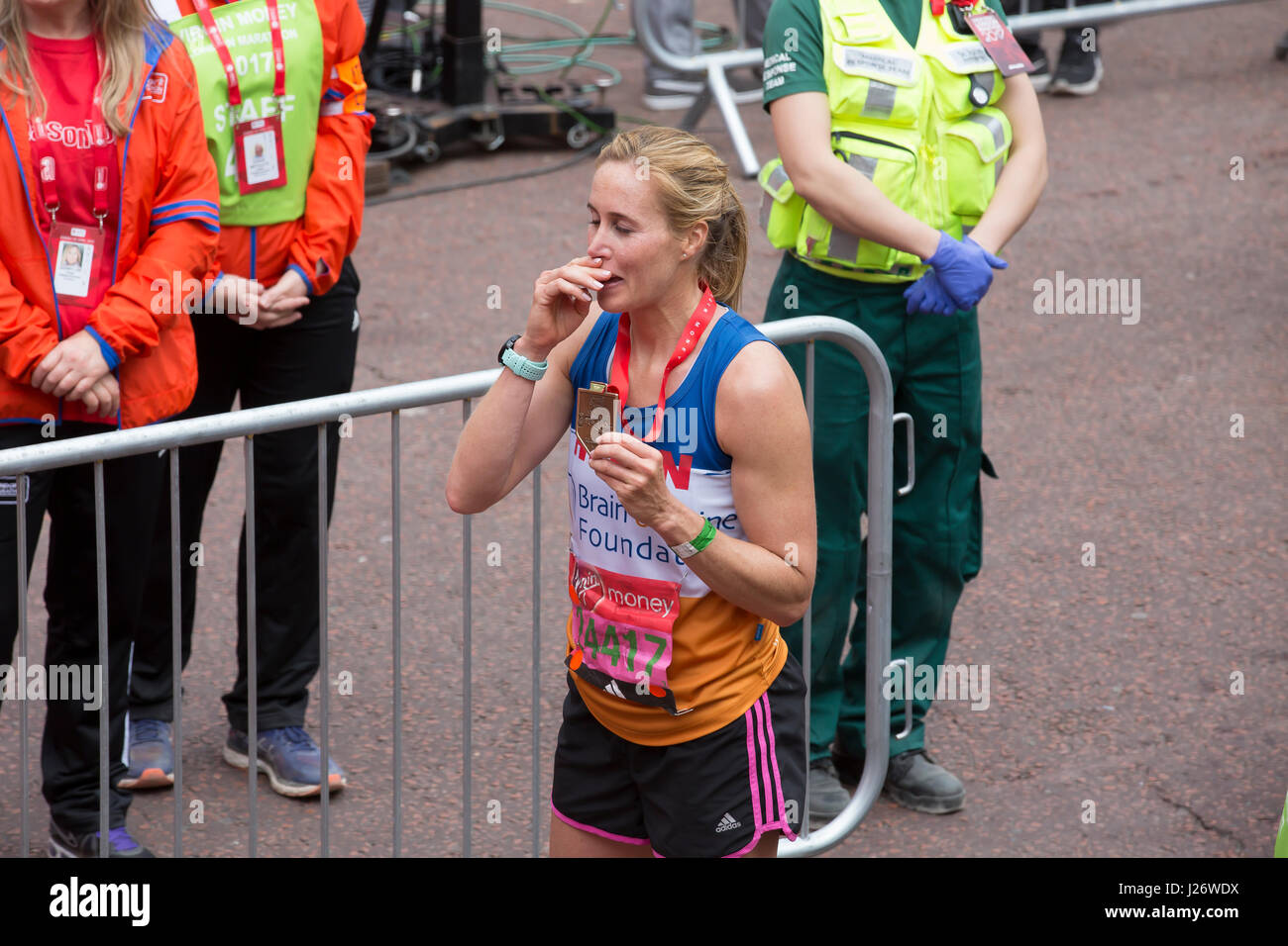 Helen Glover crosses the Virgin London Marathon Finish line in the Mall ...