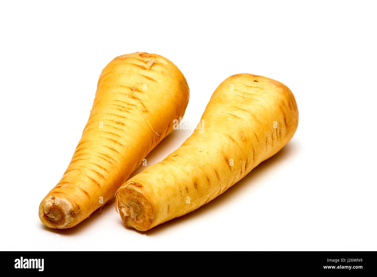Raw uncooked organic parsnips isolated on a white background Stock ...