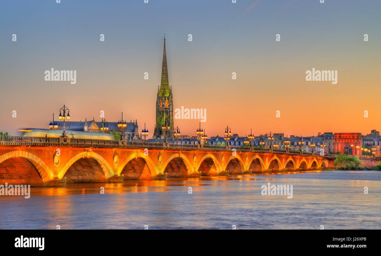Pont de Pierre bridge and Saint Michel Basilica in Bordeaux - France ...