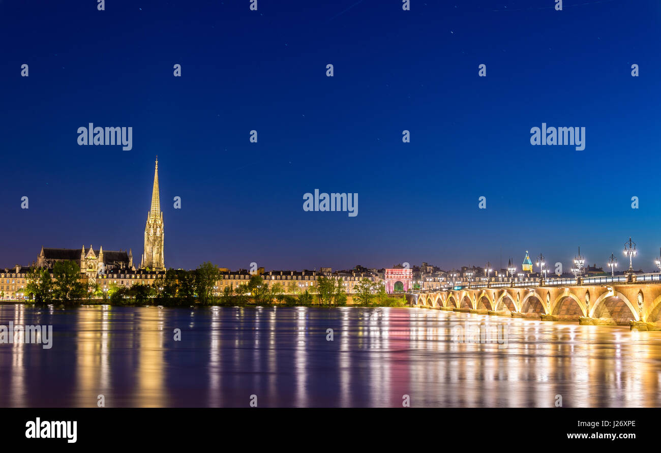 Pont de Pierre bridge and Saint Michel Basilica in Bordeaux - France ...