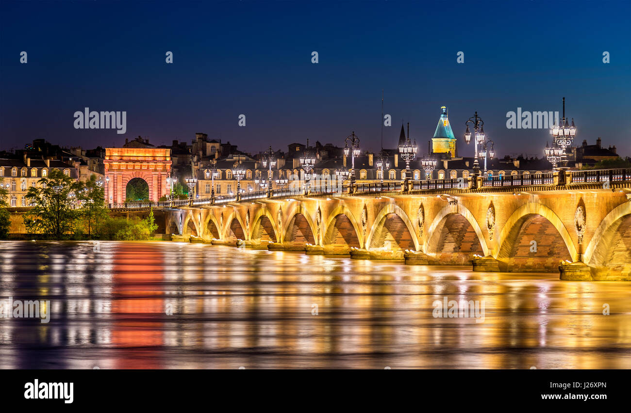 Pont de Pierre bridge and Porte de Bourgogne Gate in Bordeaux - France ...