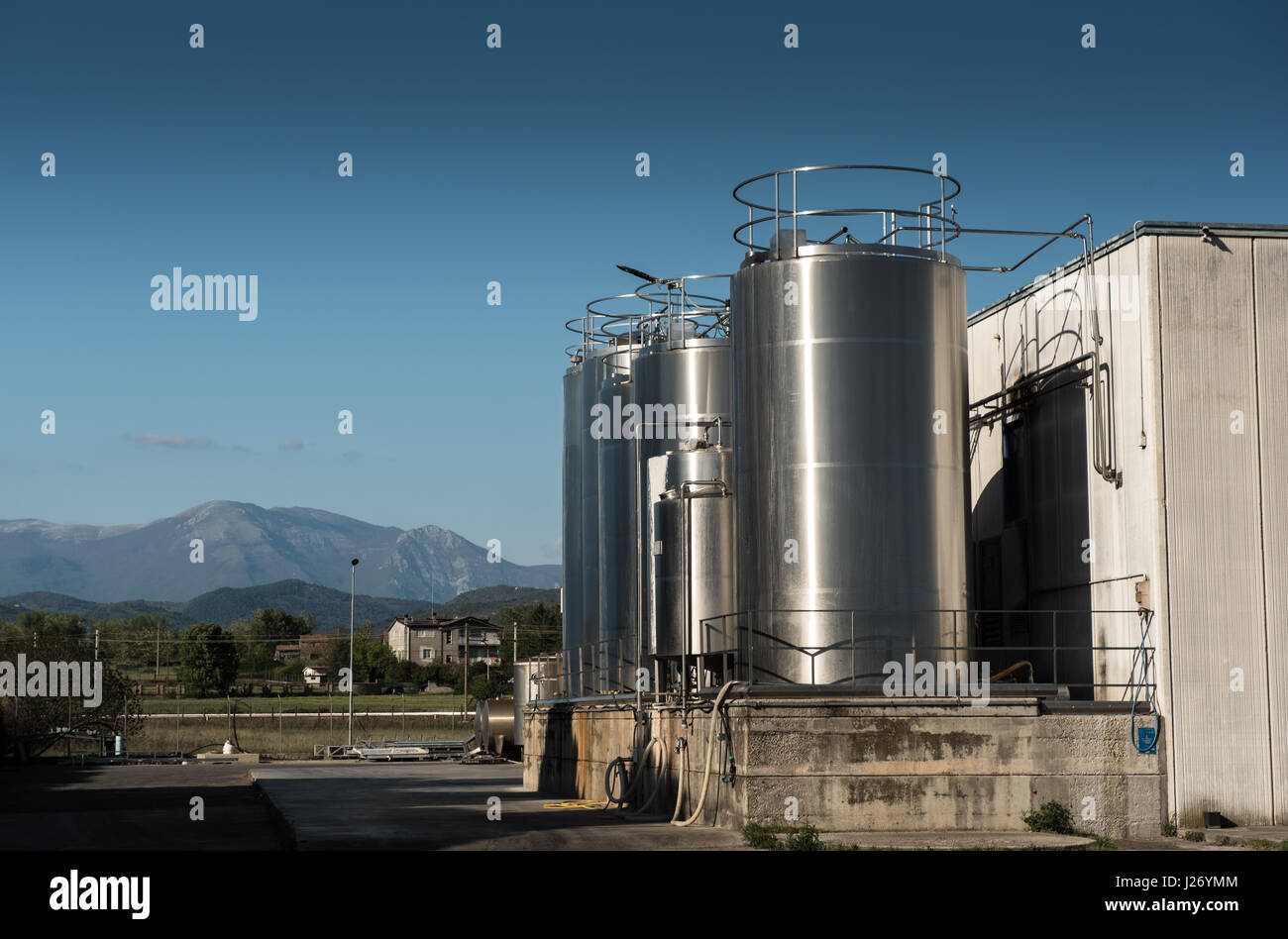 Industrial silos storage structures external view in mountainous ...