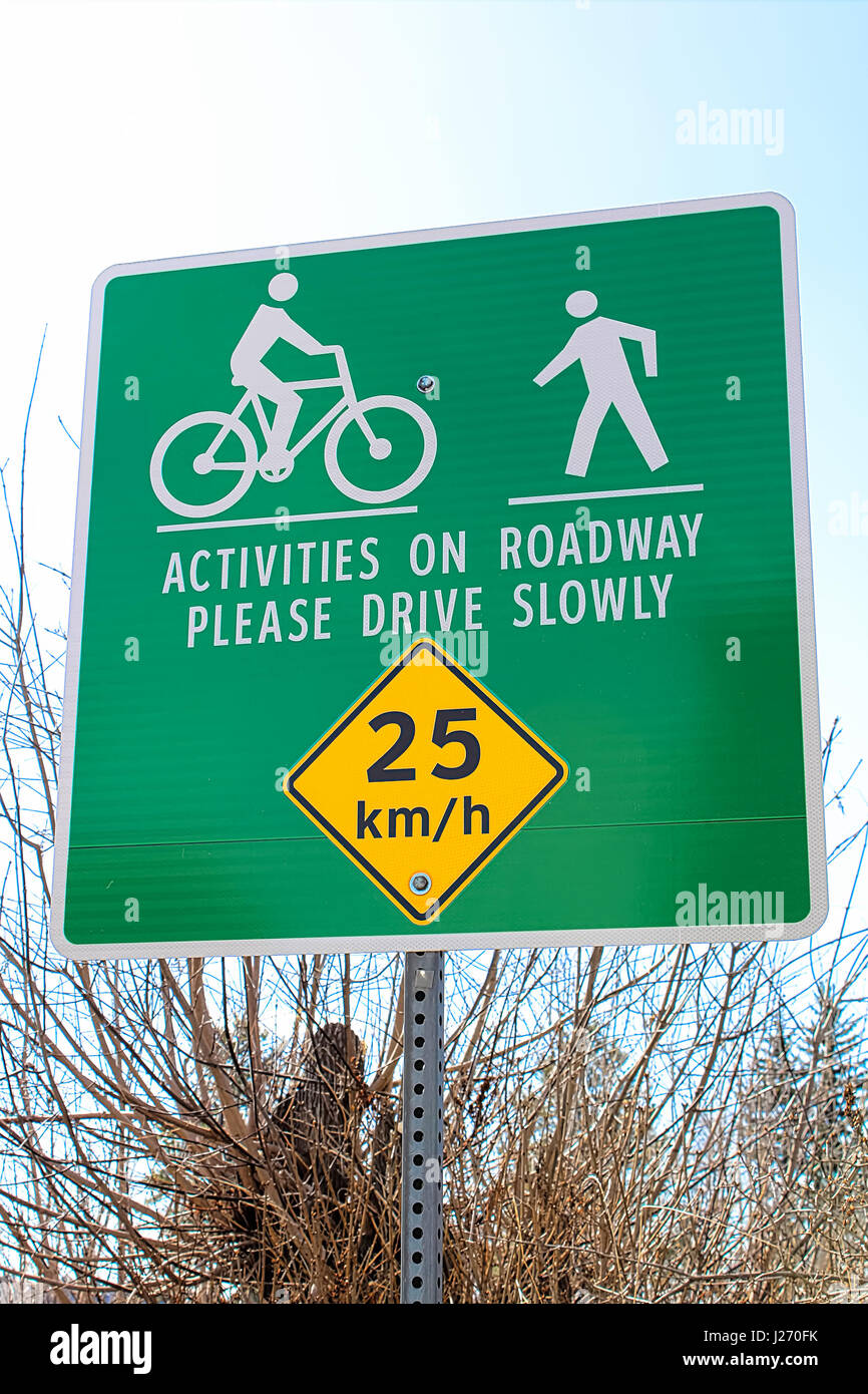 Activity warning sign along a common footpath roadway Stock Photo - Alamy