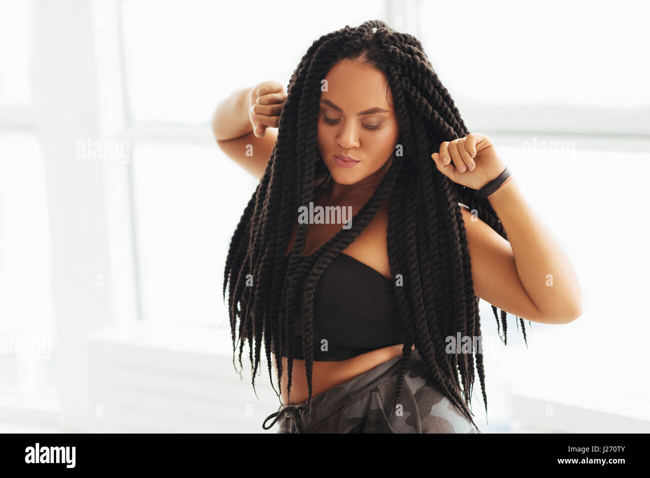 Hypnotic sensual dancer preparing for a dance premiere Stock Photo - Alamy
