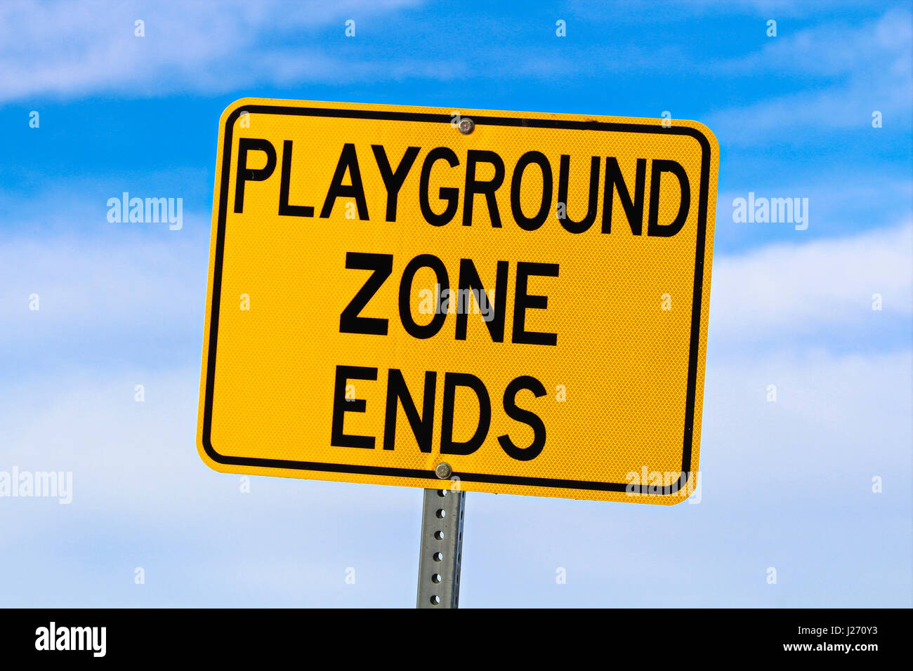 Playground Zone End Sign Against Blue Cloudy Sky Stock Photo - Alamy