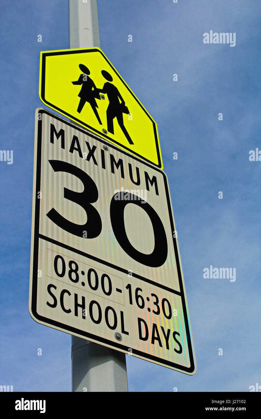 School Zone Sign with a Maximum Speed and Effective Hours Stock Photo ...