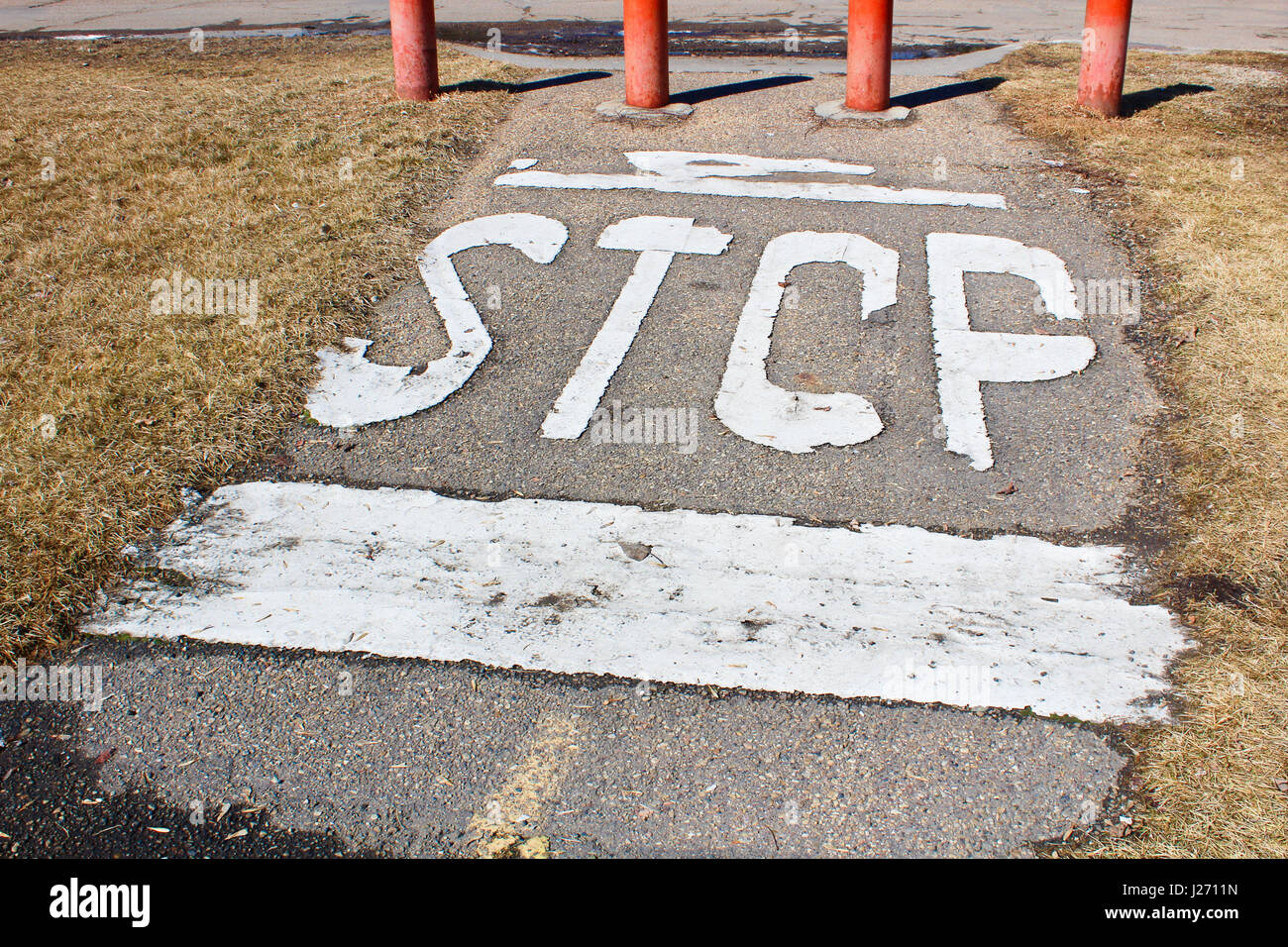 Painted stop on walking trail before main road Stock Photo - Alamy