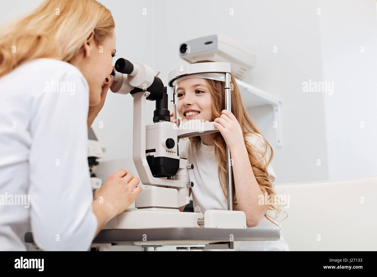 Professional ophthalmologist tracing pathology of the eye Stock Photo ...